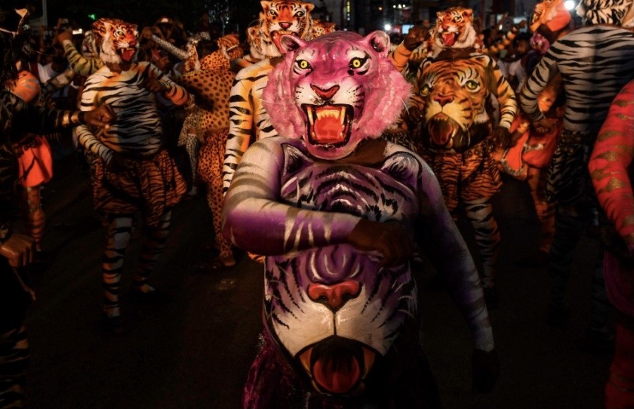 A transgender man performed Tiger Dance for the Ayyanthole Desam team