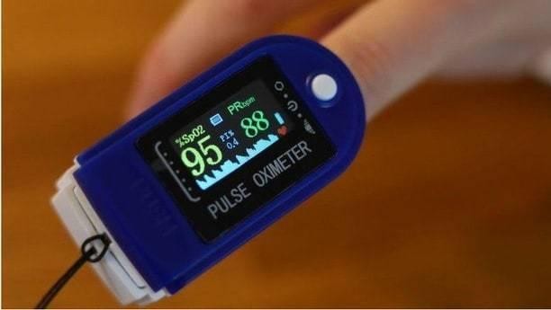 What are the symptoms of low oxygen level in body?